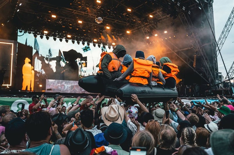 Banksy claims migrant boat artwork in crowd at Glastonbury Banksy claims migrant boat artwork in crowd at Glastonbury